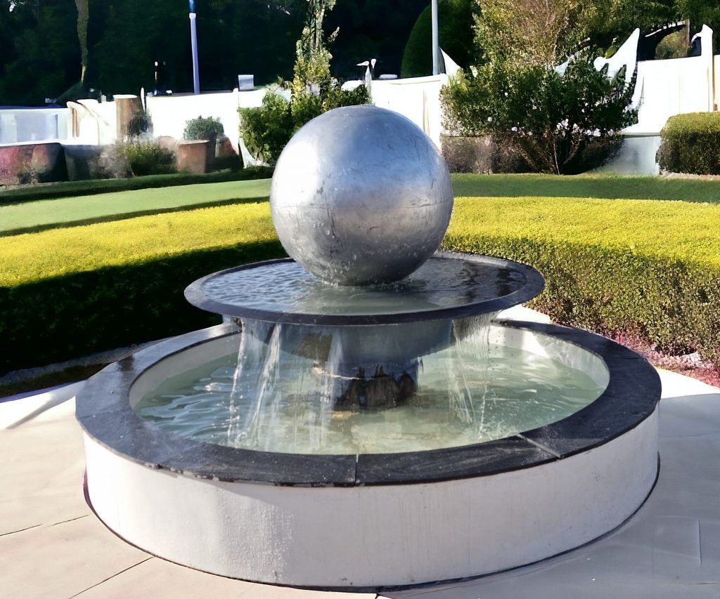 Hayward pool with Deux Riviera or Sphere Riviera water fountain - Stone ...